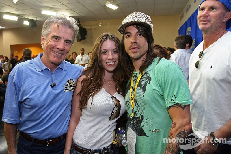 John Walsh, his daughter, Anthony Kiedis and Chad Smith pose for a ...